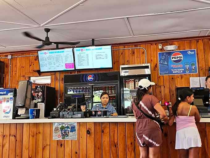 The snack bar serves up classic amusement park sustenance to hungry visitors seeking quick fuel.