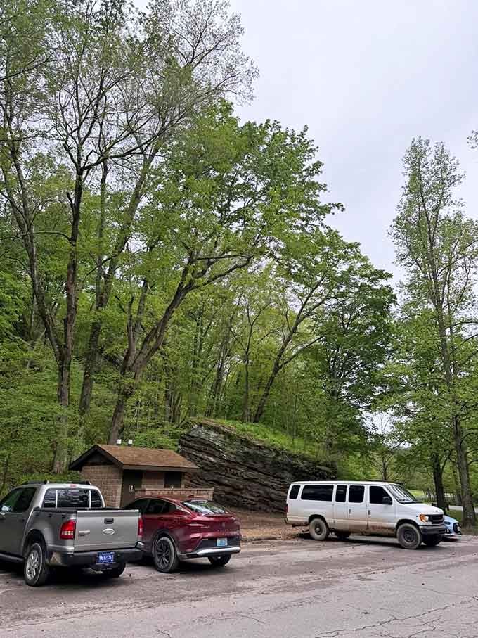 The trailhead offers ample parking and facilities, because even nature adventures need practical starting points.