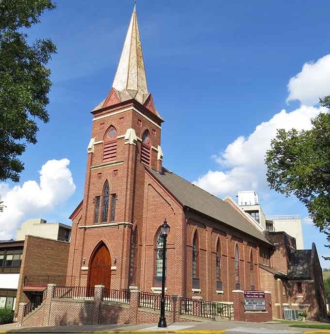 St. John's Lutheran Church spire reaches skyward with Gothic Revival grace, anchoring downtown with timeless architectural elegance and faith.