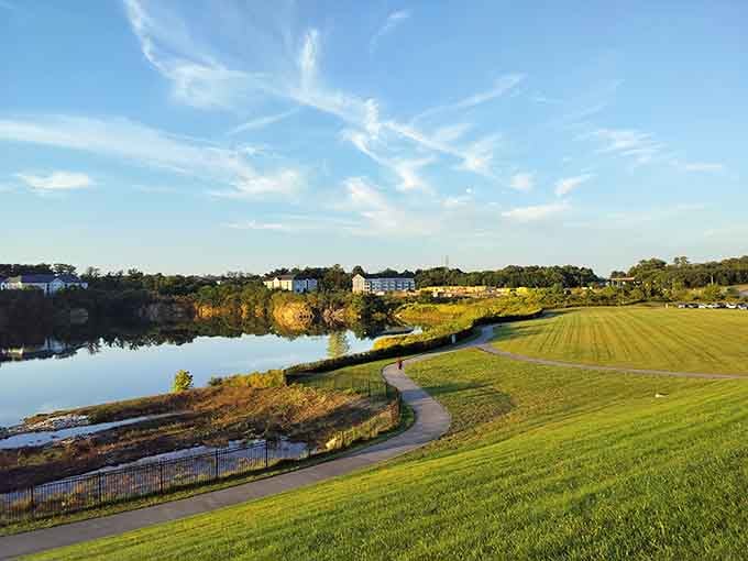 Peaceful ponds reflecting sky and trees, offering free meditation sessions to anyone willing to simply sit.