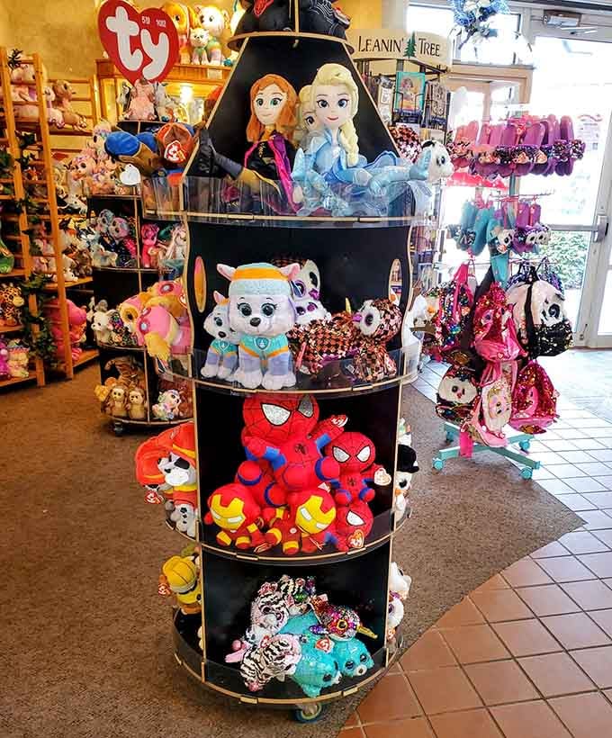 Elsa and Anna share shelf space with Spider-Man in a gift shop that understands every age has its heroes.