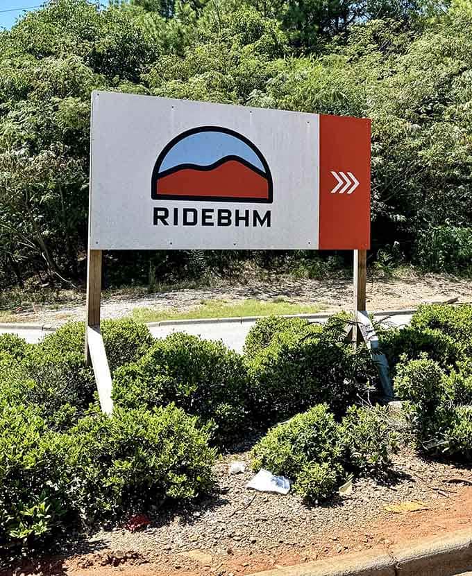 The welcoming RideBHM sign marks the entrance to Alabama's first downhill park, where two-wheeled adventures officially begin.