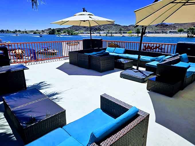 Lounge seating on the deck transforms casual dining into a full-blown vacation vibe without leaving the state.