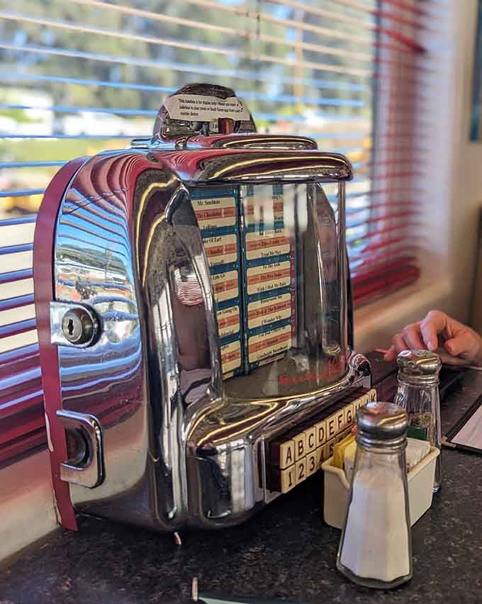 A chrome tabletop jukebox sitting next to salt and pepper shakers is the perfect soundtrack to your pancakes.
