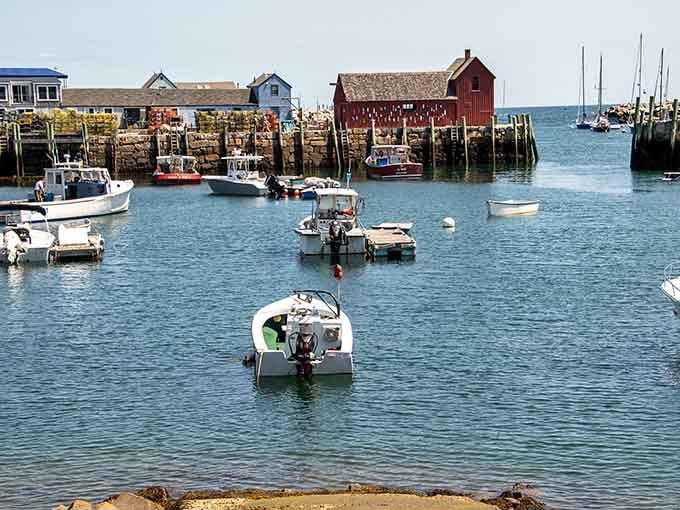 Working harbor meets postcard perfection where lobster boats bob alongside sailboats in perfect harmony.