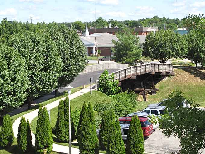 Tree-lined pathways and charming bridges connect neighborhoods with the kind of walkability cities twice this size envy.