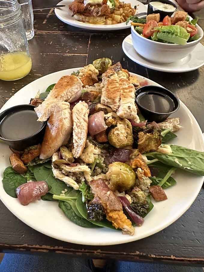 This salad with roasted vegetables looks so good it might actually convert dedicated carnivores into believers.