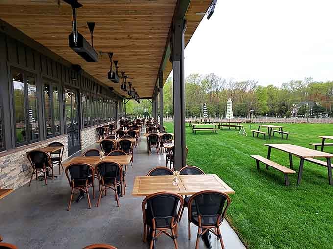 Covered patio seating where you can enjoy your wine while contemplating the pastoral views you didn't know existed here.