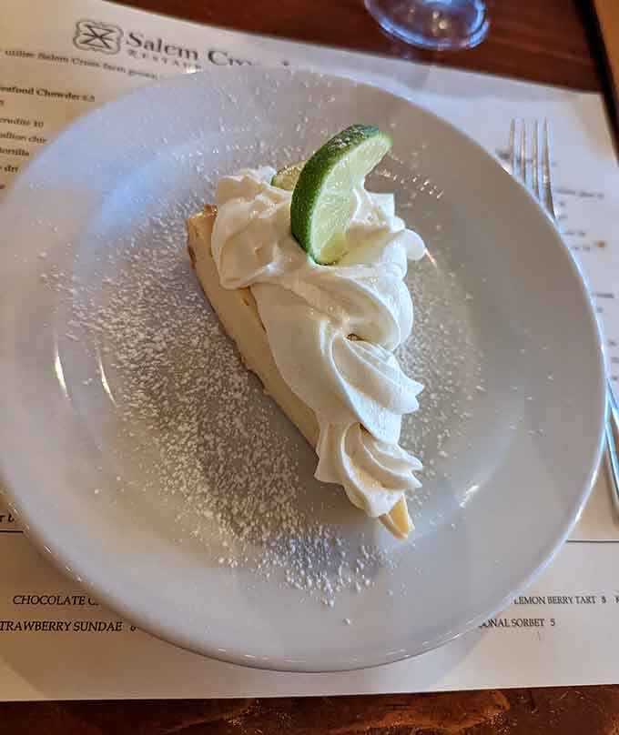 Key lime pie topped with enough whipped cream to make your cardiologist nervous but your soul happy.