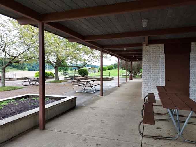Covered picnic areas where families gather to eat, laugh, and pretend they're not checking their phones under the table.