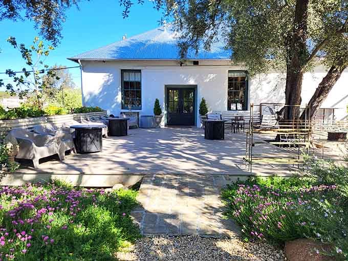 The peaceful backyard patio offers the perfect spot to contemplate all the treasures you're about to buy.