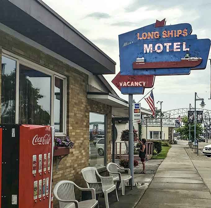 Vintage motel signs advertising vacancy to travelers who appreciate character over cookie-cutter chain conformity and continental breakfast.