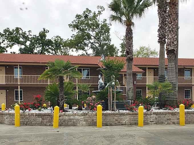 Palm trees frame this extended stay inn where visitors can settle in and experience Savannah like locals.