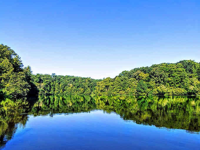 The James River reflects the sky like nature's own mirror, peaceful enough to make you forget your phone exists.