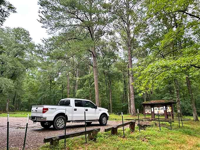 The parking area serves as your gateway to the past, where pickup trucks replace horse-drawn wagons as preferred transportation methods.