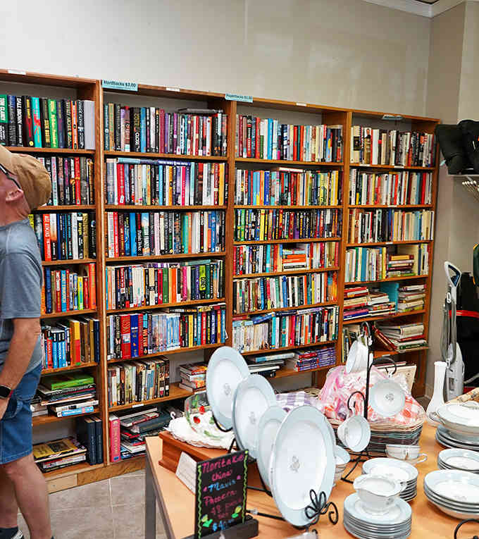Floor-to-ceiling bookshelves overflow with stories waiting for new readers who appreciate both literature and smart spending habits.