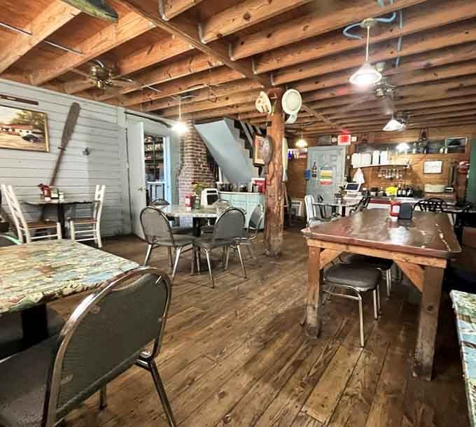 Rustic wooden tables and exposed beams create an atmosphere where everyone feels like family.