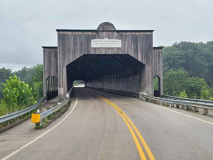That weathered wood facade tells stories of countless journeys across the valley below.