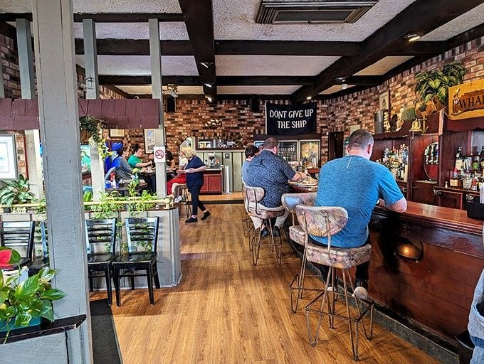 Locals and visitors alike gather here, proof that great food brings people together regardless of zip code.