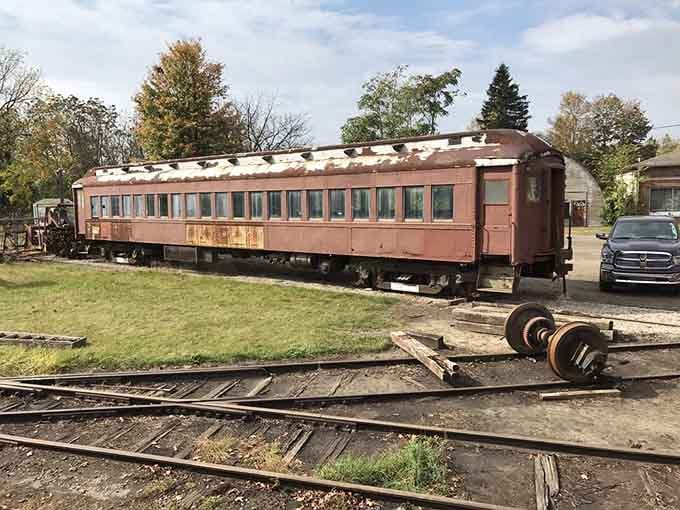 This weathered passenger car has stories embedded in every rivet, waiting patiently for its next restoration chapter to begin.