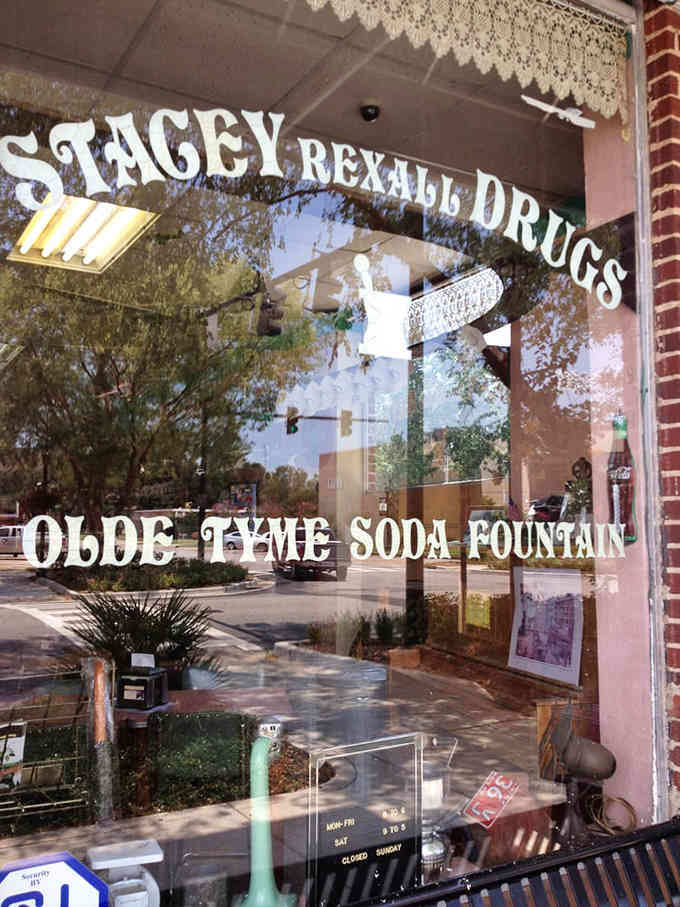 The window lettering spells out your destination for happiness, visible from the street like a beacon of hope.