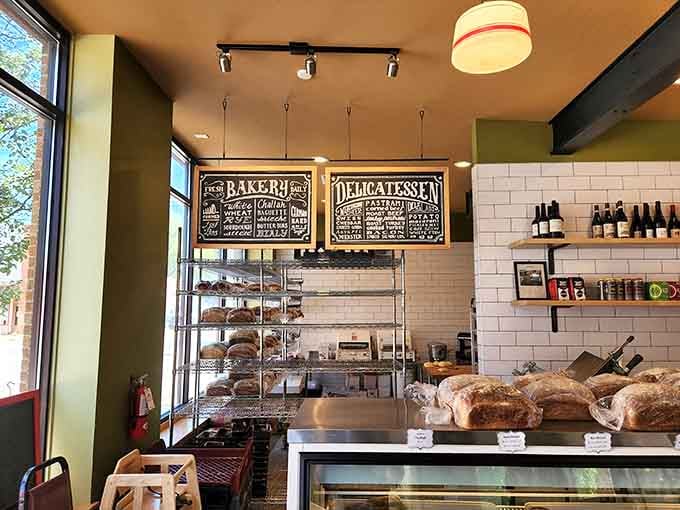 Fresh-baked goods and artisan breads line the display case, tempting you before you've even ordered your sandwich.