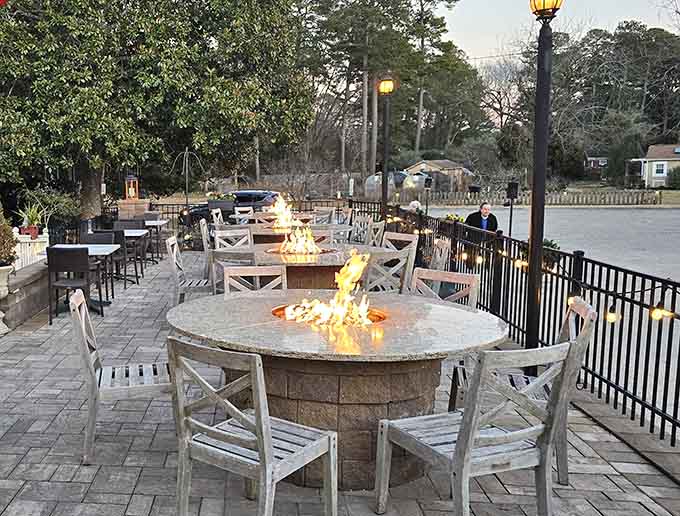 Fire pits by the water turn outdoor dining into an experience, adding warmth and ambiance to already spectacular evenings.
