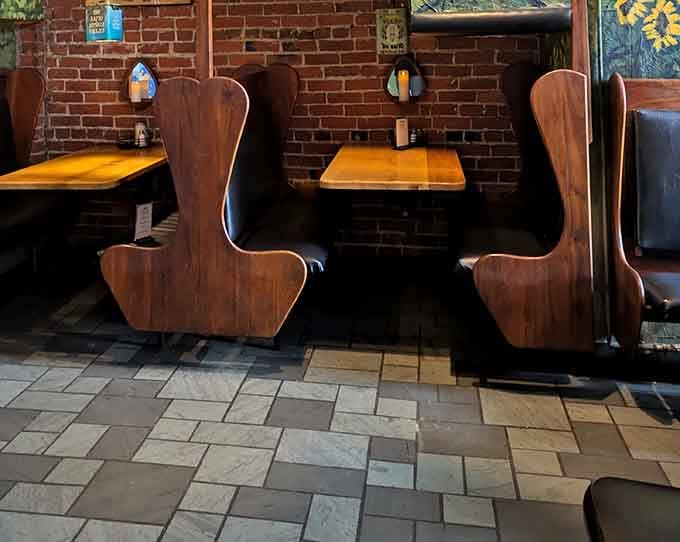 Those distinctive wooden booth backs add character while providing cozy spots for lingering over coffee and conversation.
