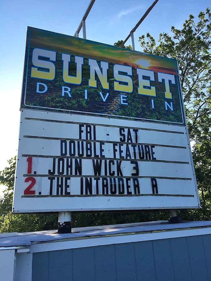 The marquee announces tonight's double feature, delivering twice the entertainment for your admission dollar spent.