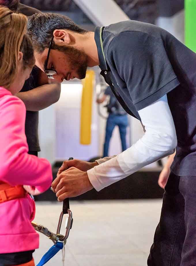 Staff members ensuring your adventure stays fun and safe, like lifeguards for your good time.