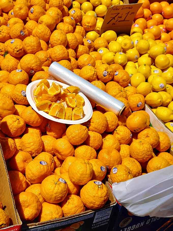 Fresh citrus stacked like golden pyramids, bringing produce market vibes to your flea market adventure.