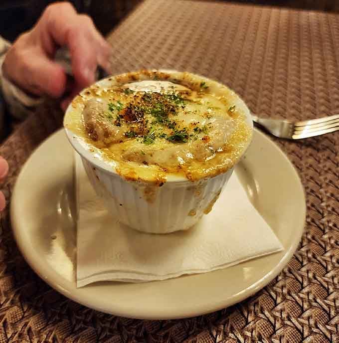 French onion soup bubbling under a blanket of melted cheese is pure liquid comfort in a crock.