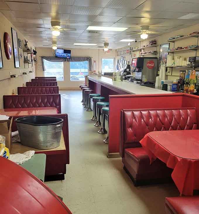 Another view of this retro paradise where red vinyl booths promise comfort and great meals await.