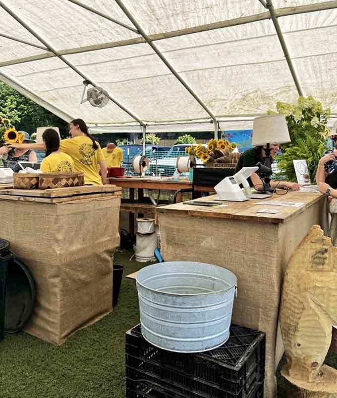 Simple checkout stations under a tent remind you that the best shopping experiences don't need air conditioning or muzak.