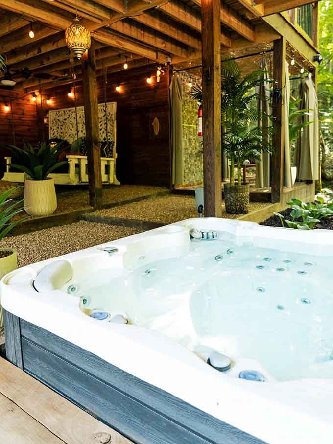 Hot tub under the trees with Moroccan lanterns overhead? Someone really thought of everything here.