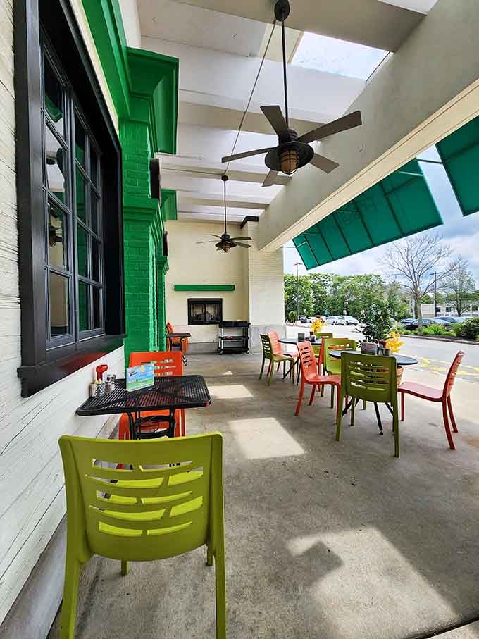 Even the outdoor patio embraces that playful spirit with bright chairs perfect for leisurely weekend brunching sessions.