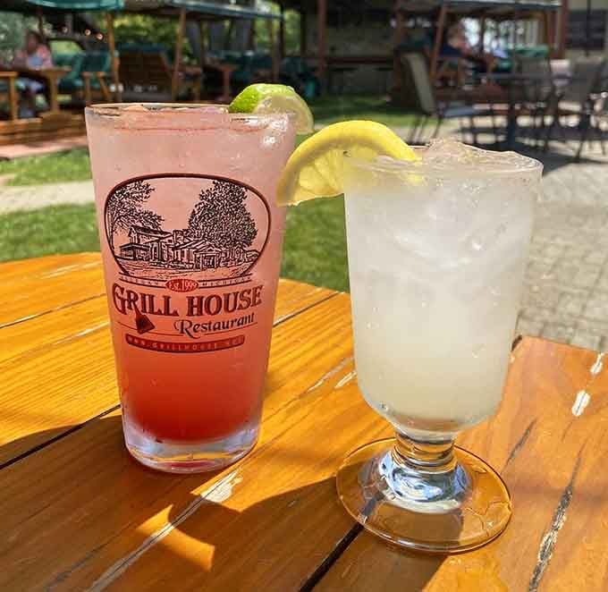 Refreshing drinks with citrus garnishes on a sunny patio table taste like summer vacation, even on a Wednesday afternoon.