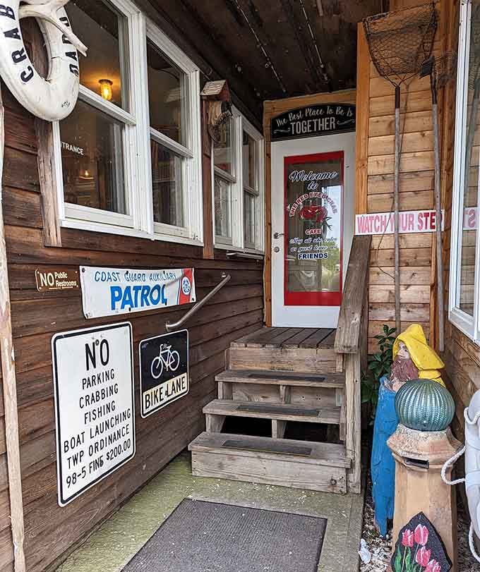 The entrance welcomes you with quirky charm and a fisherman statue who never complains about the weather.