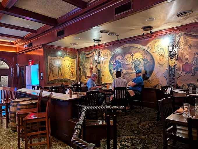 Murals depicting Old West cattle scenes transport diners to Arizona's ranching heritage while they enjoy their contemporary steaks.