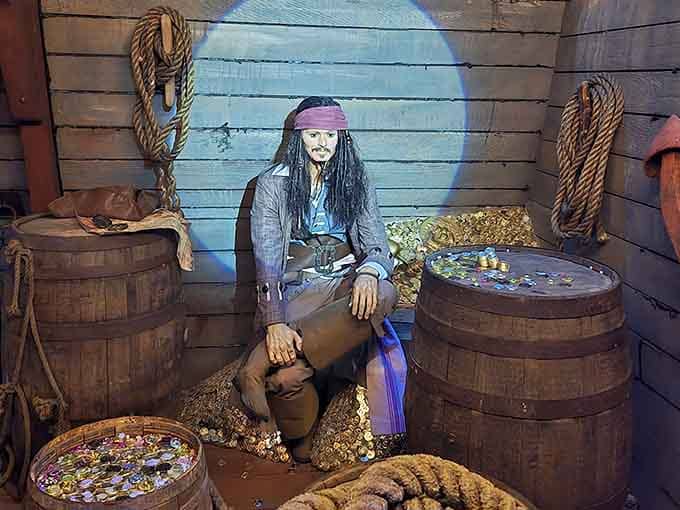 Captain Jack Sparrow guards his treasure with characteristic swagger, surrounded by barrels of gold that you sadly can't take home.
