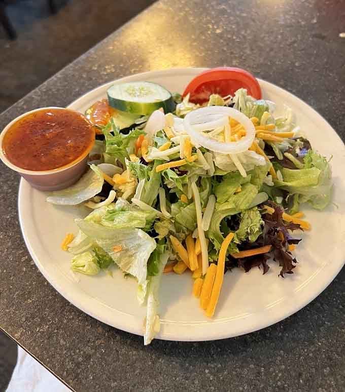 A fresh salad that proves vegetables can hold their own, even in a steakhouse known for prime rib.