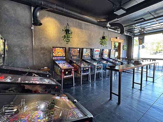 Vintage pinball machines line up like soldiers, ready to provide entertainment between pizza slices and beer sips.