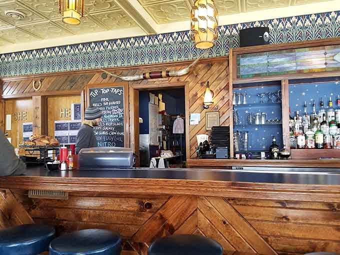 That beautiful wooden bar beckons like a siren, promising cold drinks and warm conversation with friendly neighborhood folks.