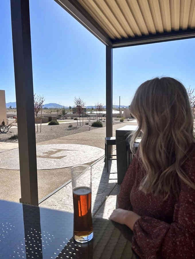 Sometimes the best seat in the house means watching the world go by with something cold nearby.