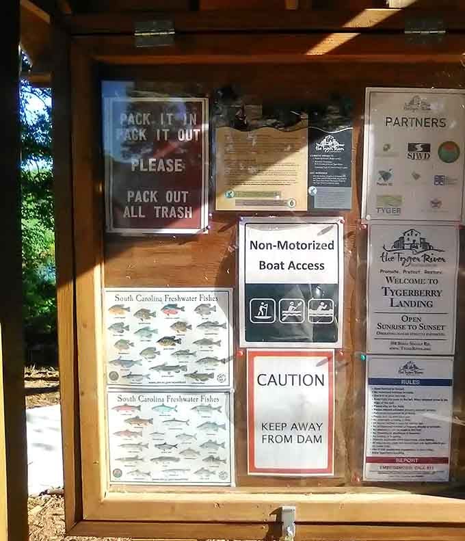 The information board displays local fish species like a wanted poster for your next catch.