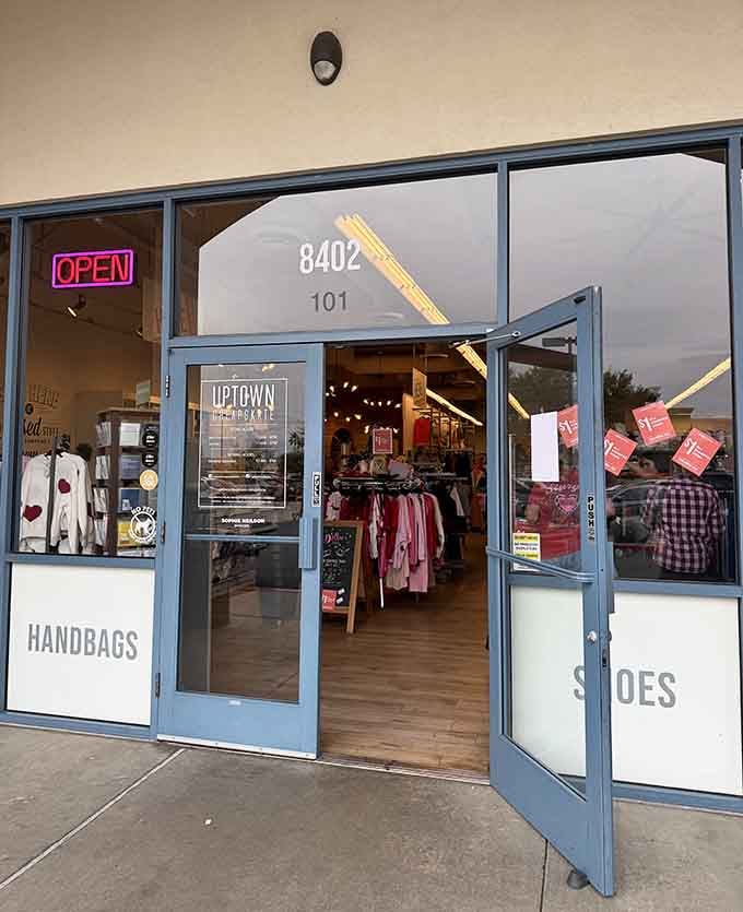 The storefront practically announces "handbags and shoes inside" like it knows exactly what you came here looking for today.