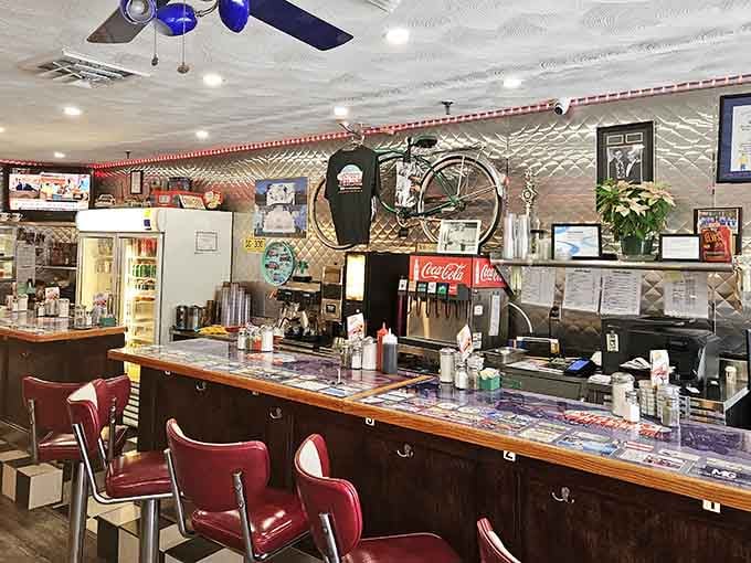 That long counter with red stools offers front-row seats to the greatest breakfast show on earth.