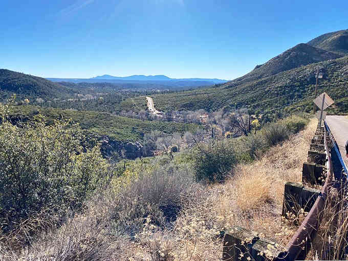 The scenic drive delivers mountain vistas before you even lace up your boots, bonus beauty for the journey.