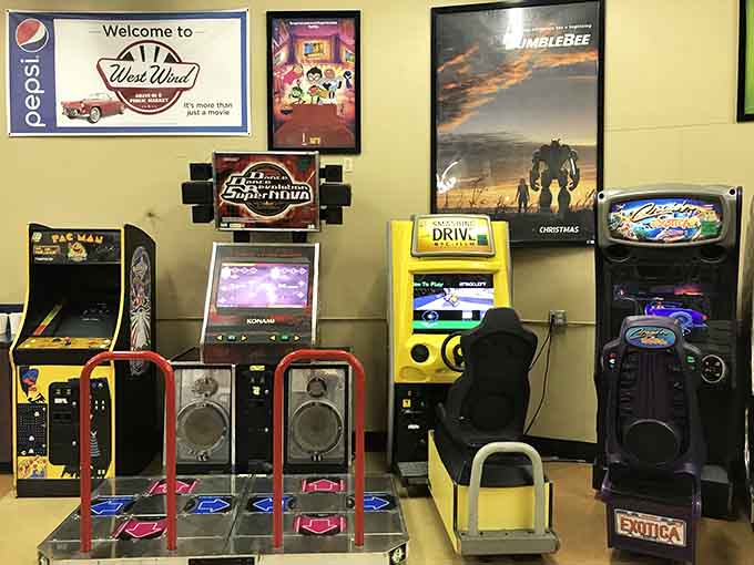 Pac-Man and racing games offer pre-show entertainment for kids who've never known life without smartphones.