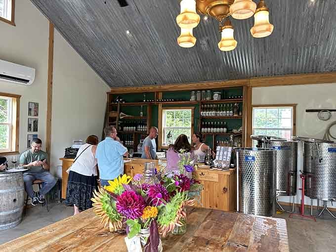 Fresh flowers on the counter and happy visitors at the bar capture that perfect weekend afternoon energy we all crave.